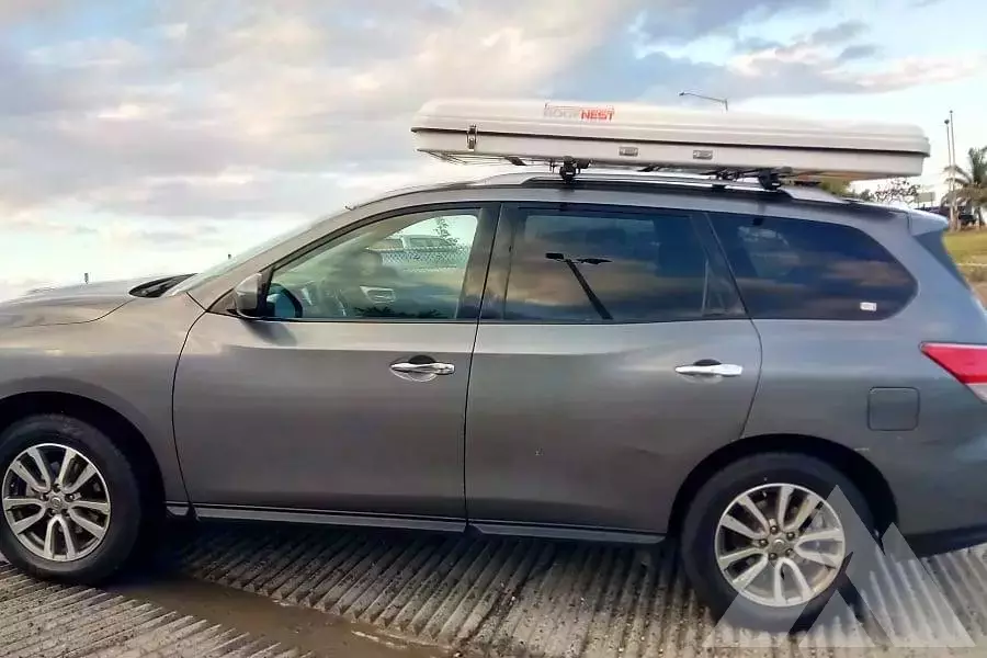 Gray AWD Nissan Pathfinder with Rooftop Tent for Rent in , Hawaii