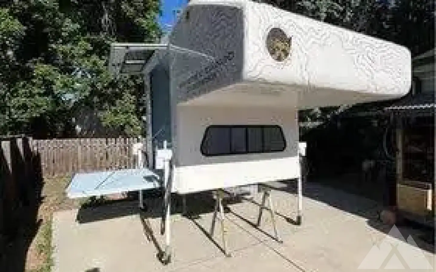 Used 4-Season flatbed truck camper shell for sale in Fort Collins, Colorado